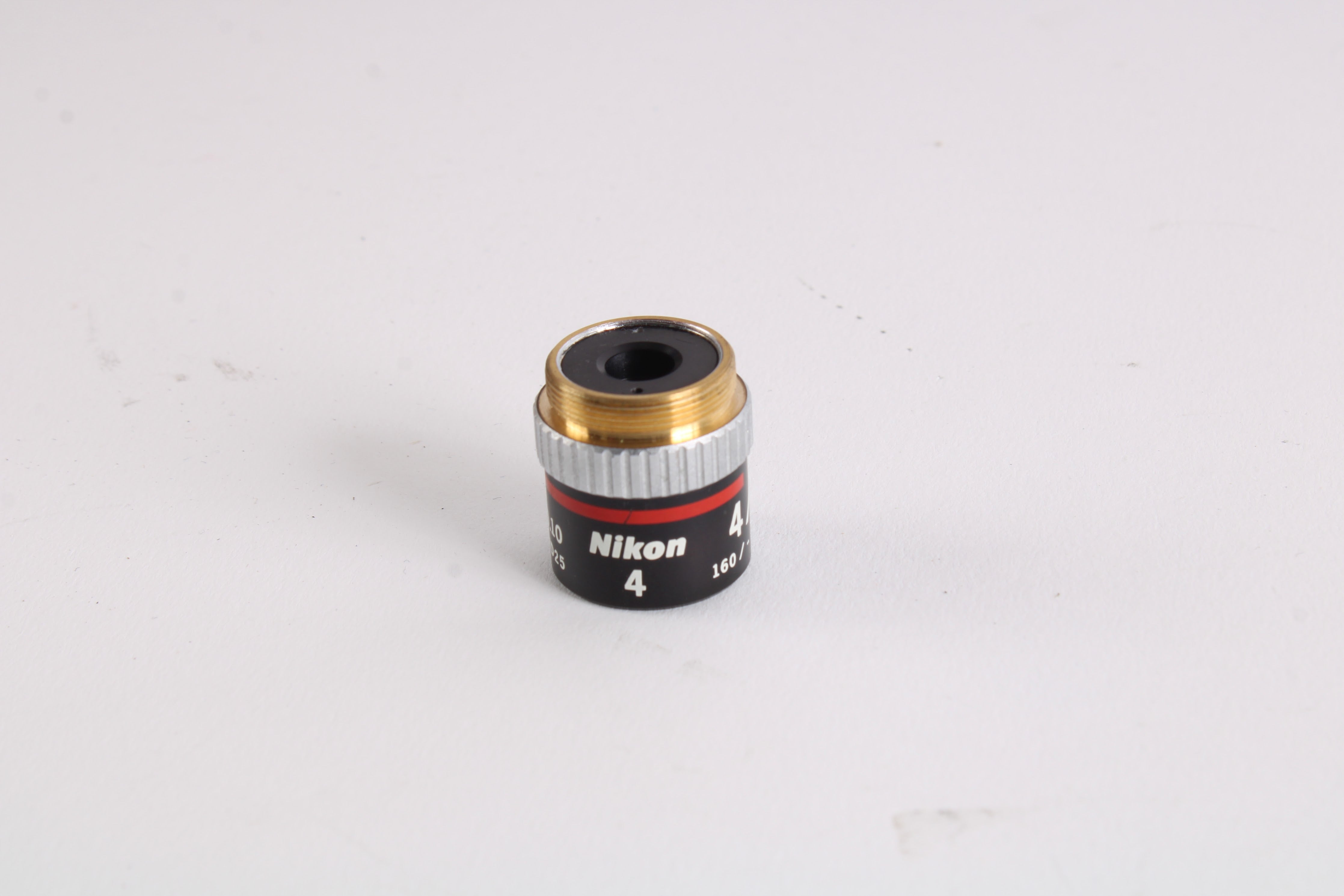Nikon 4 4/0.10 160/-WD25 Microscope Objective – NTC Tech
